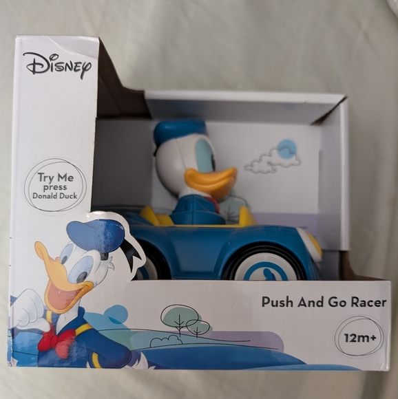 Disney | Toys | Disney Donald Duck Push And Go Racer Blue And Yellow ...